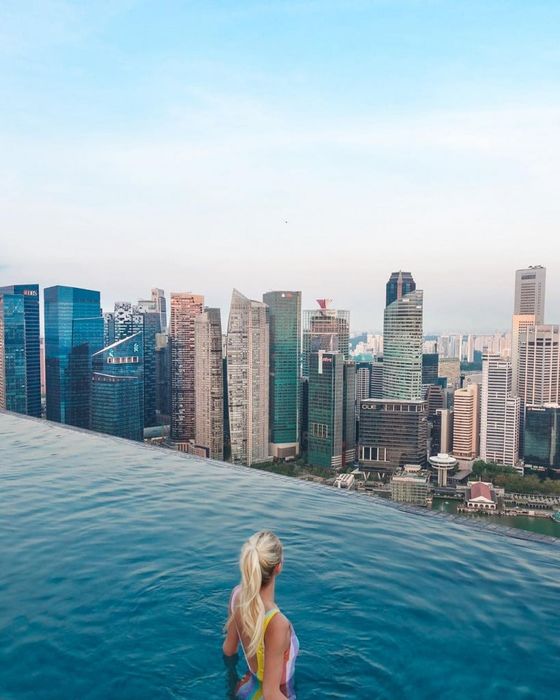 Immerse yourself in the world's largest infinity pool at Marina Bay ...