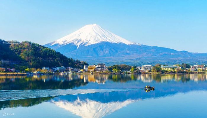 Kawaguchi Lake is a popular tourist destination in Japan, known for its ...